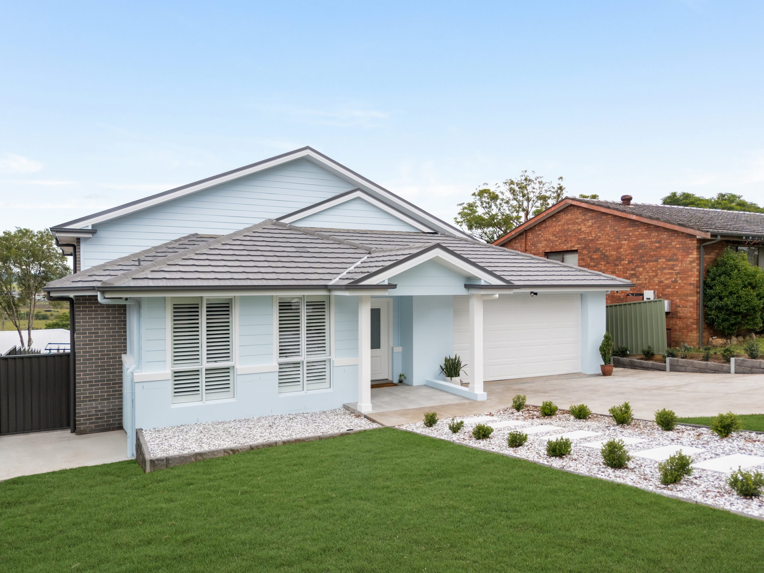 Turn Your Sloping Block Into a Dream Home With Custom Split-Level ...